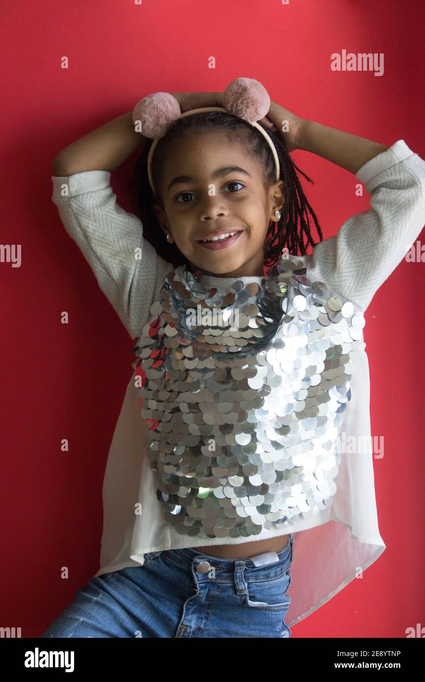 Portrait of a cute little multiracial girl Stock Photo - Alamy