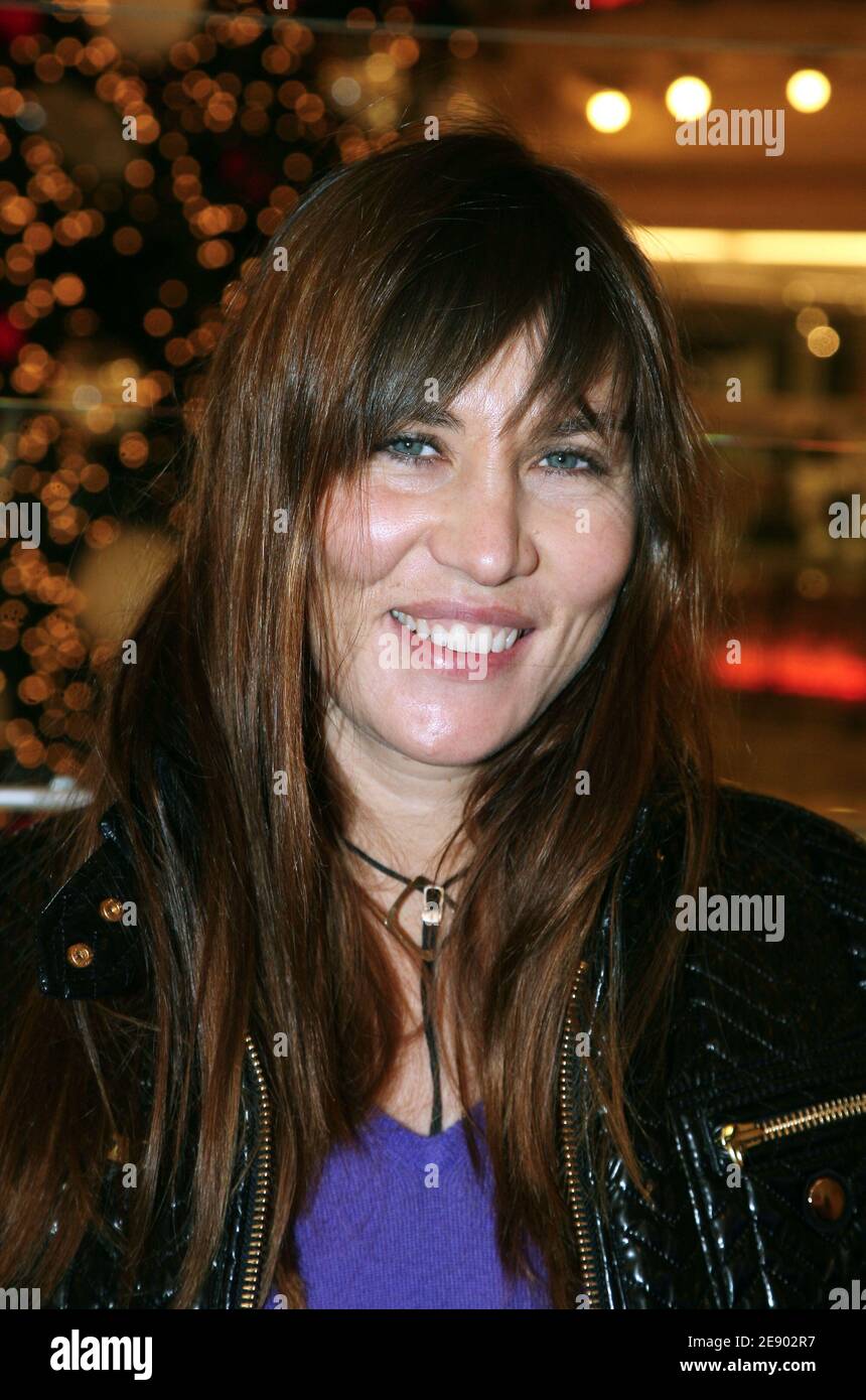 French actress Mathilde Seigner turns on XMas lights at Galeries ...