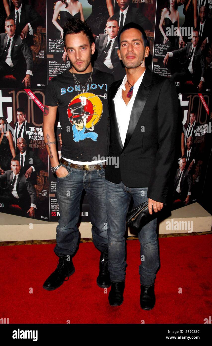 Designer Marc Jacobs (R) and Jason Preston attend the OUT 100 Awards at ...