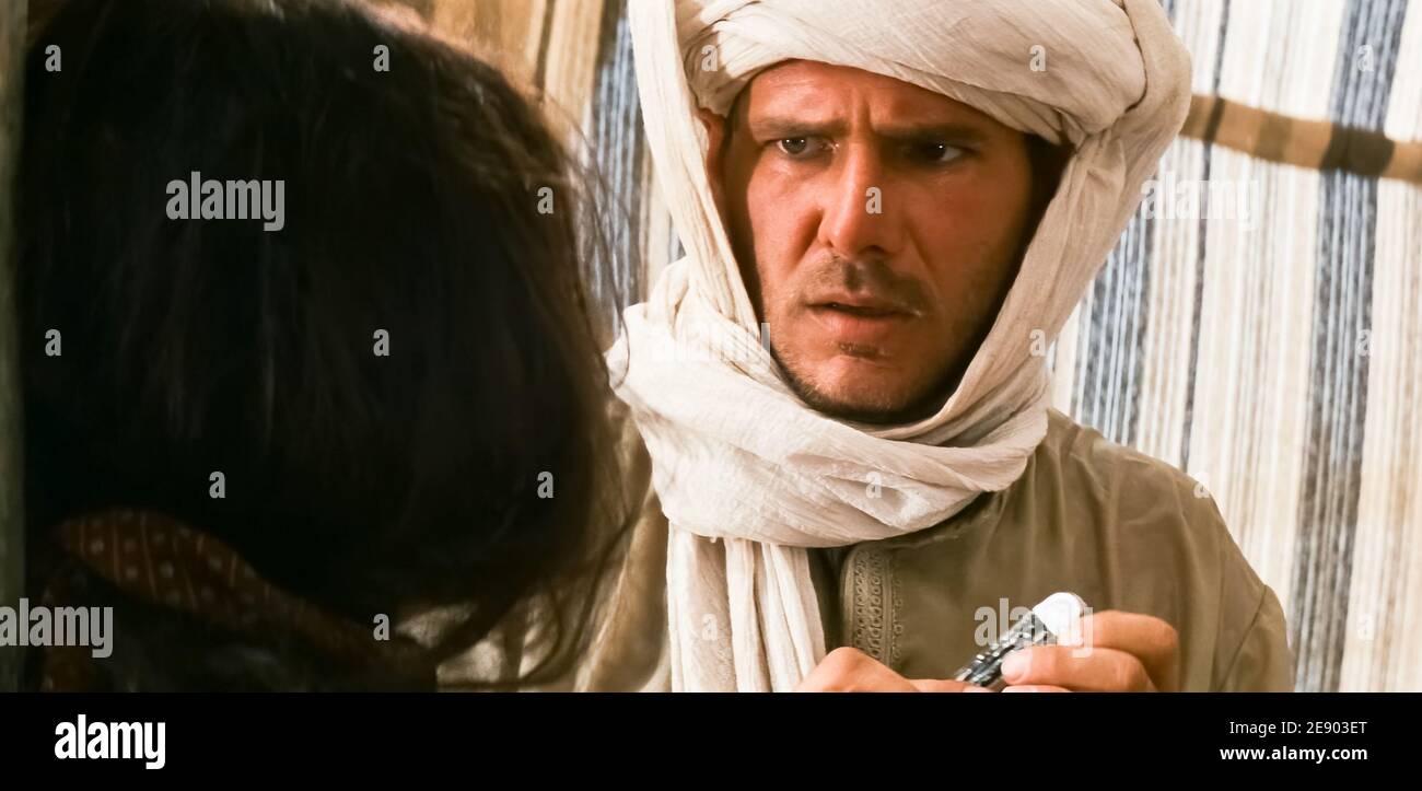 USA. Harrison Ford and Karen Allen n a scene from the (C)Paramount ...