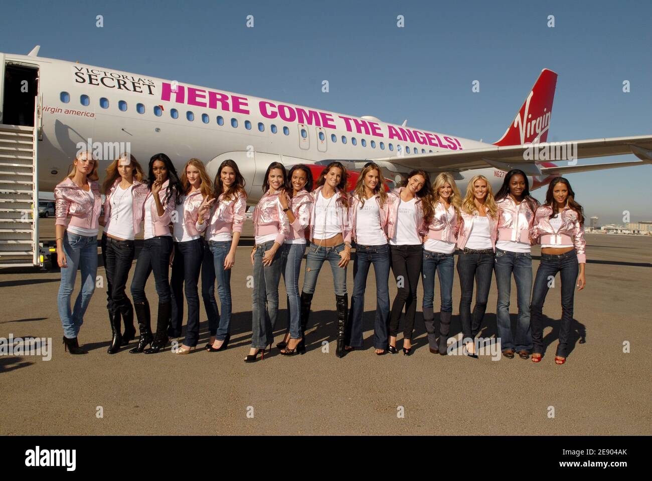Victoria's Secret models pose upon their arrival at LAX Airport in Los ...