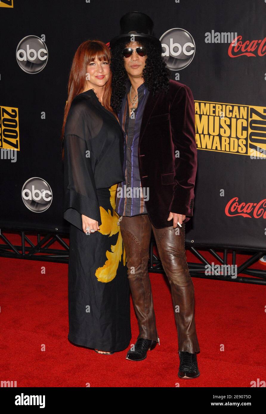 Slash and his wife Perla Ferrar attend the 2007 American Music Awards ...