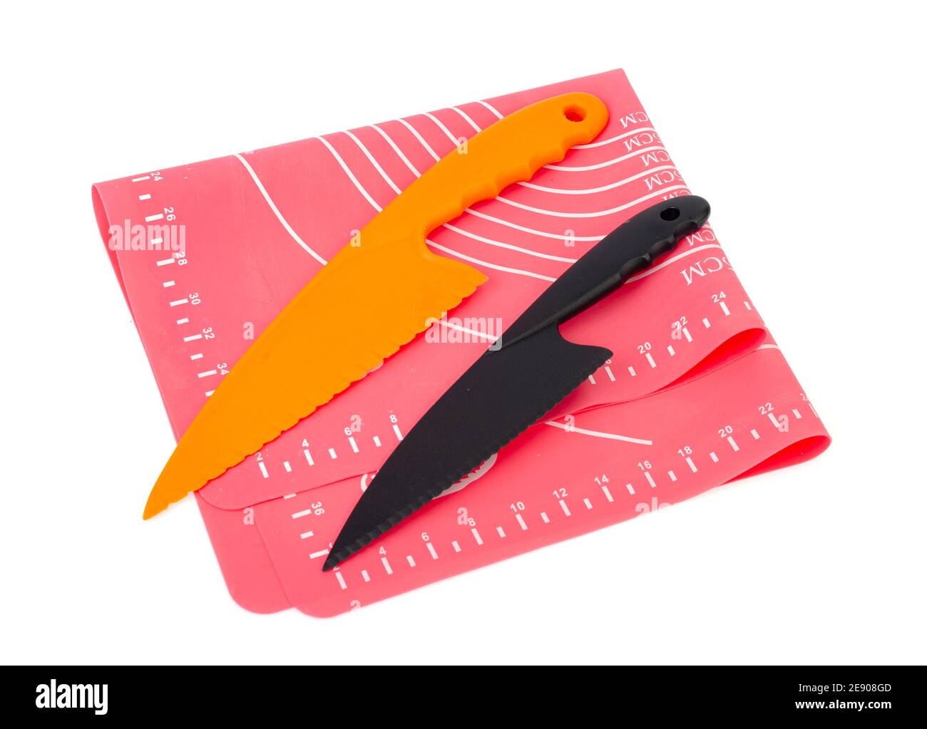 Kitchen plastic colored knives. Studio Photo Stock Photo - Alamy