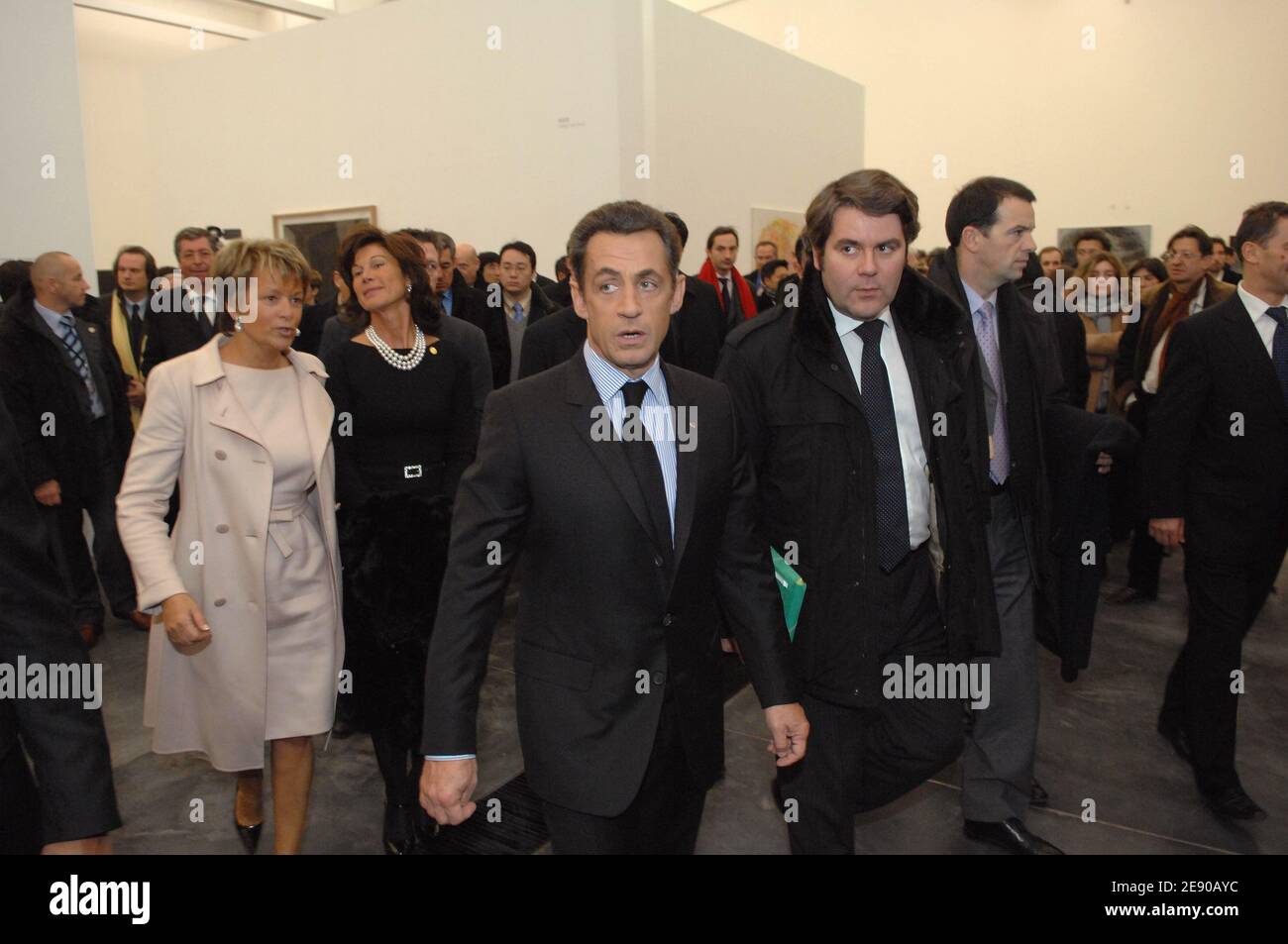 France's President Nicolas Sarkozy along with Franck Louvrier, visits ...