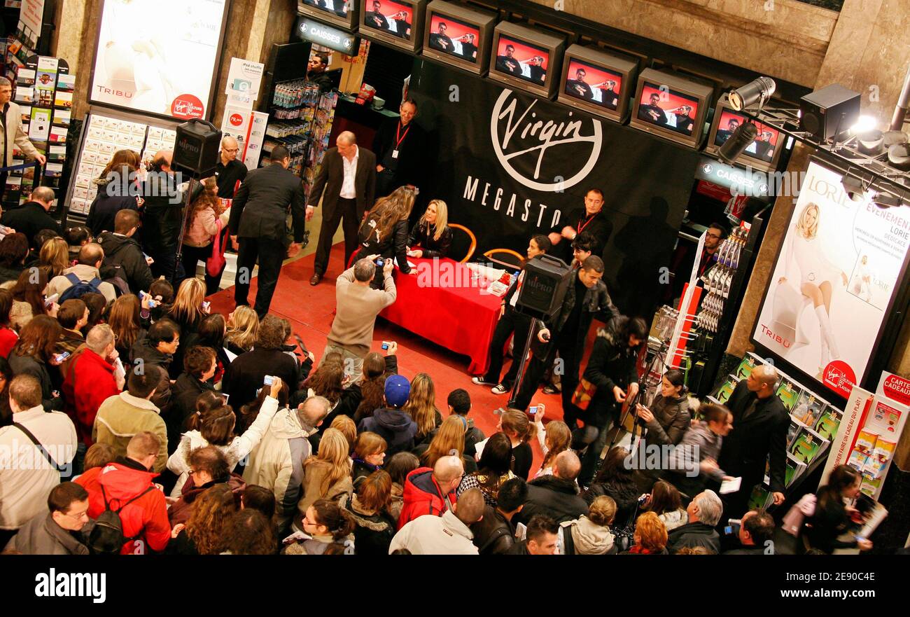 French singer Lorie signs copies of her new album '2Lor en moi' at the ...