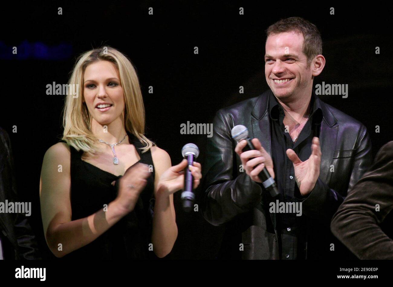 Hosts Lorie and her boyfriend Garou appear on stage for the opening ...