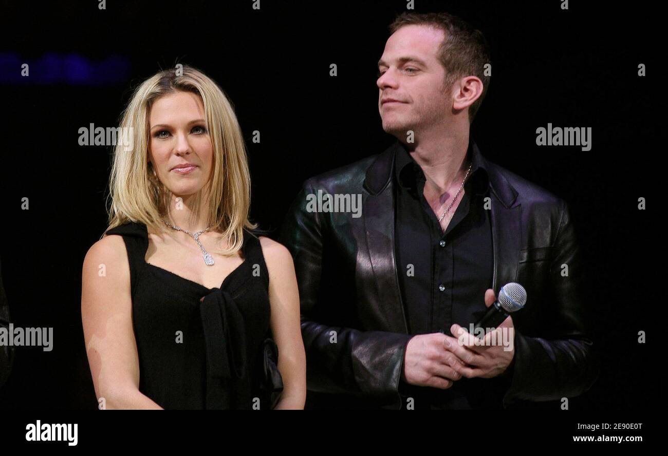 Hosts Lorie and her boyfriend Garou appear on stage for the opening ...