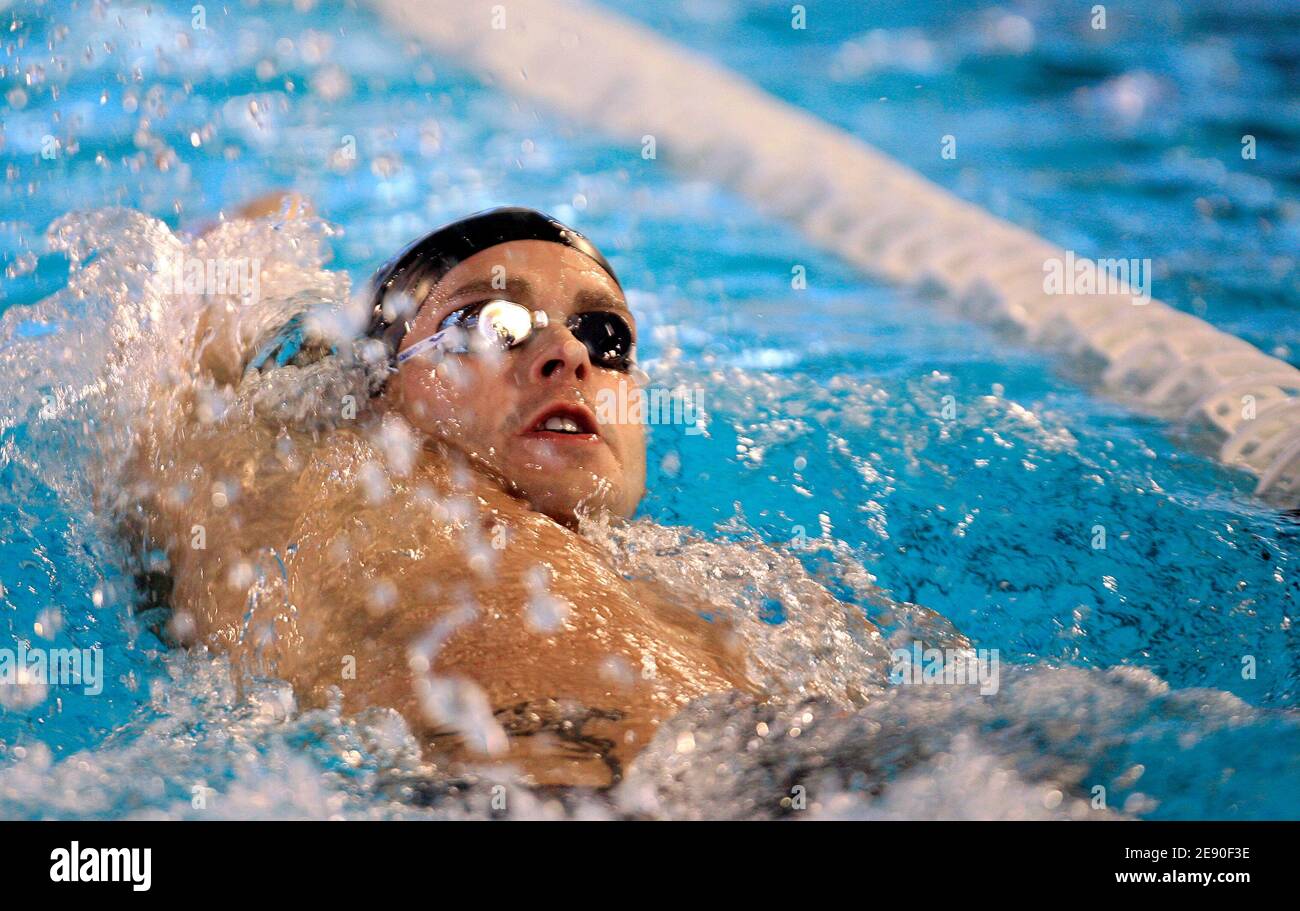 France's Pierre Roger competes on men's 200 meters backstroke during ...