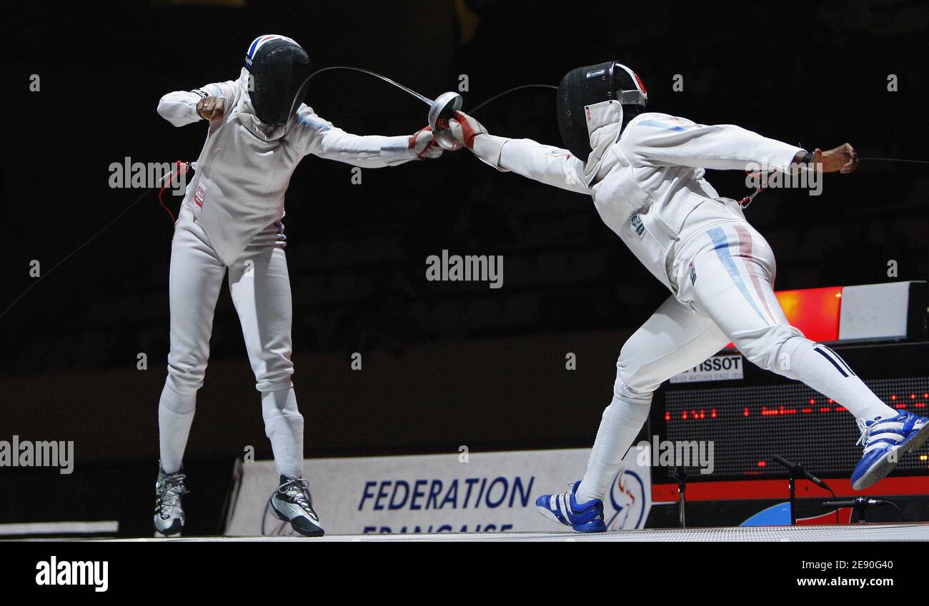 France's Laura Flessel-Colovic (L) duels with Sarah Daninthe at the ...