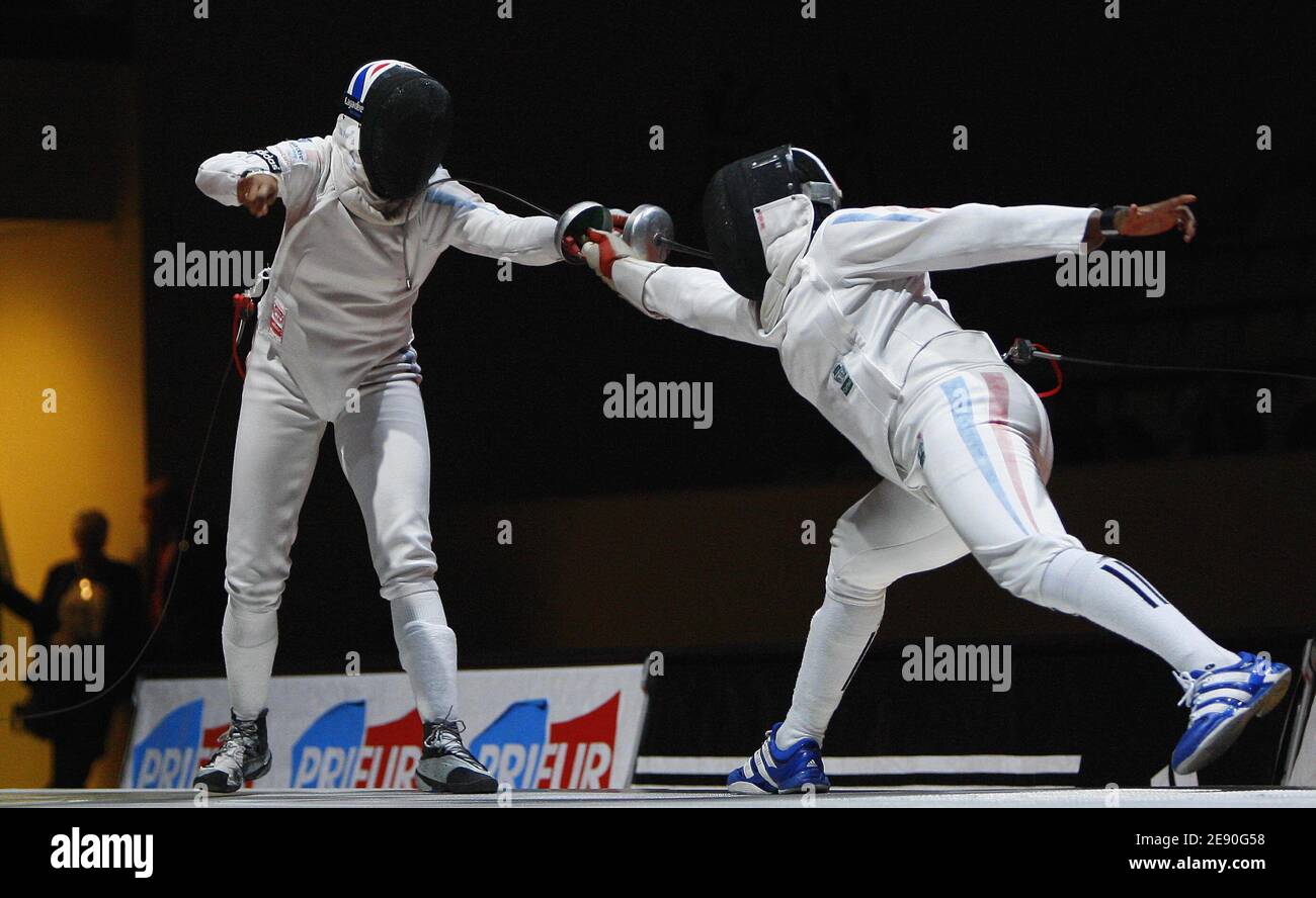 France's Laura Flessel-Colovic (L) duels with Sarah Daninthe at the ...