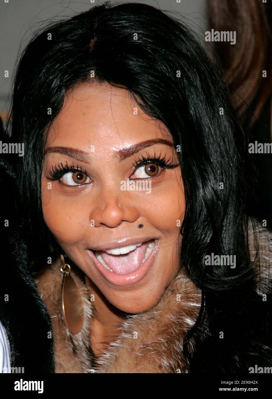 Rapper Lil Kim poses at 'The Perfect Holiday' cast party, held at club ...