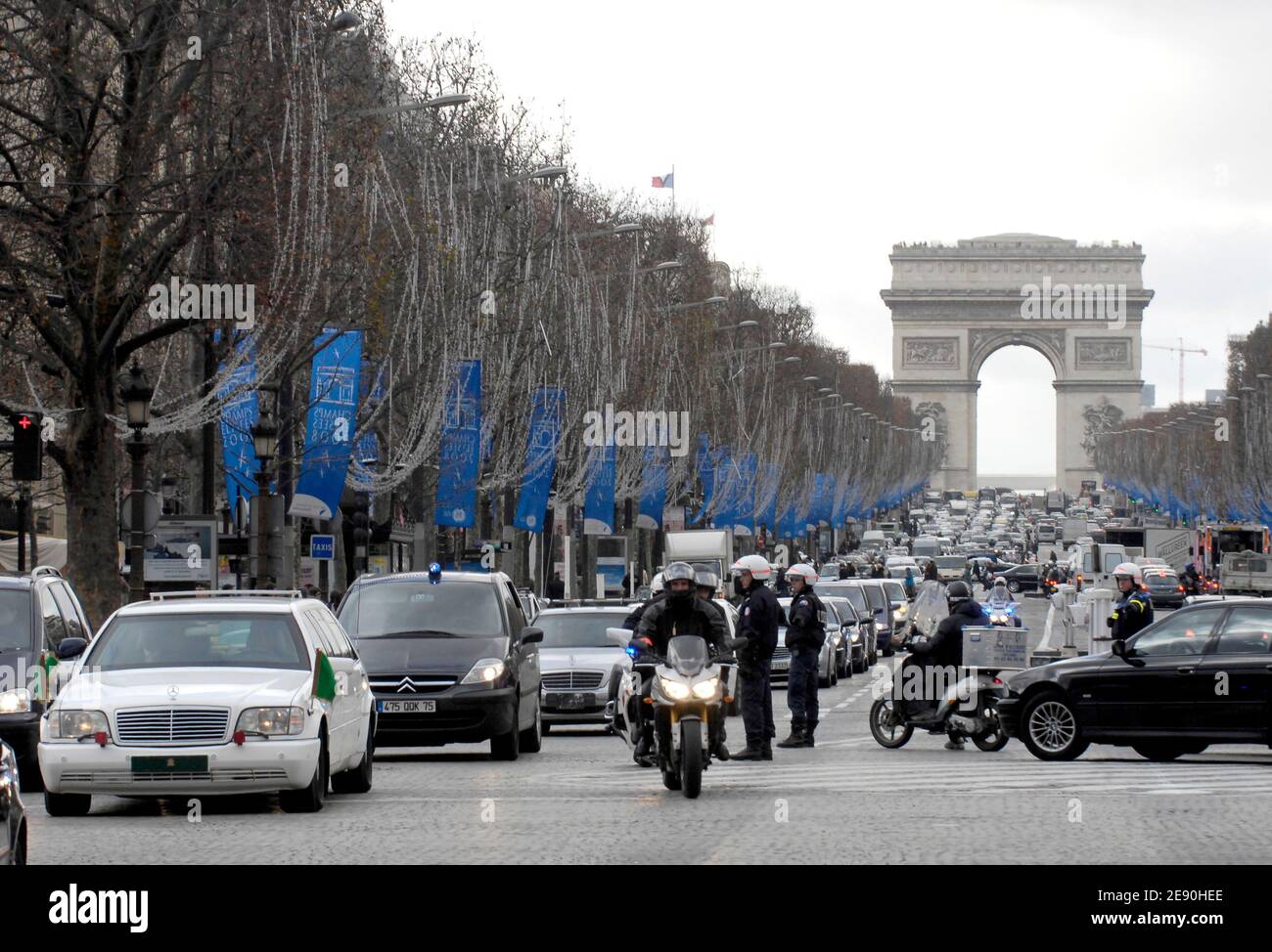 Libyan leader Moammar Gadhafi's official car passes through the Champs ...