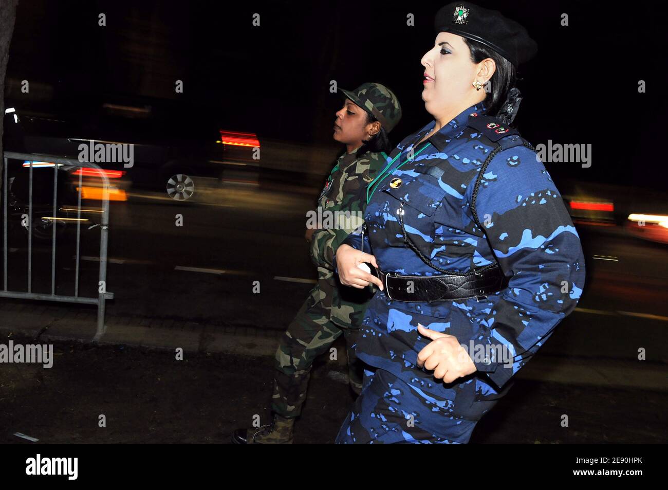 Libyan female bodyguards "amazone" run next to leader Moammar Gadhafi's ...
