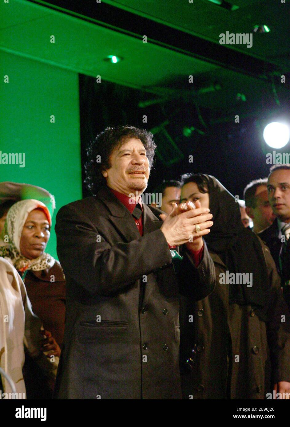 Libyan leader muammar gaddafi attends hi-res stock photography and ...