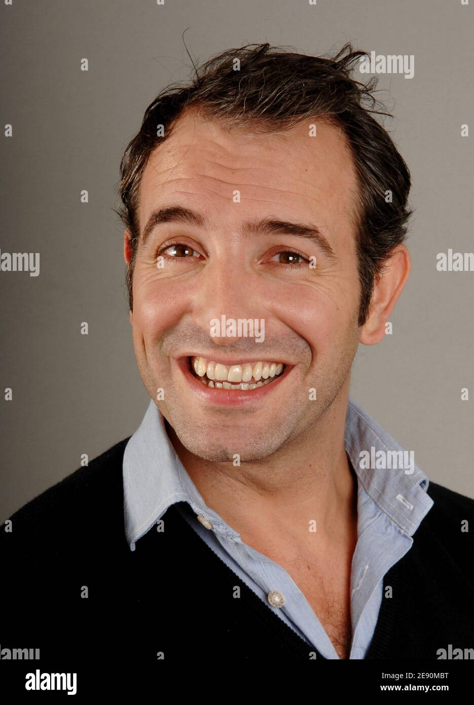 French actor Jean Dujardin poses for our photographer with his trophy ...