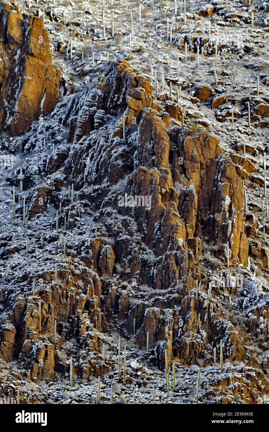 Snow looks like white frosting dripping on mountain ridge at Gates Pass ...