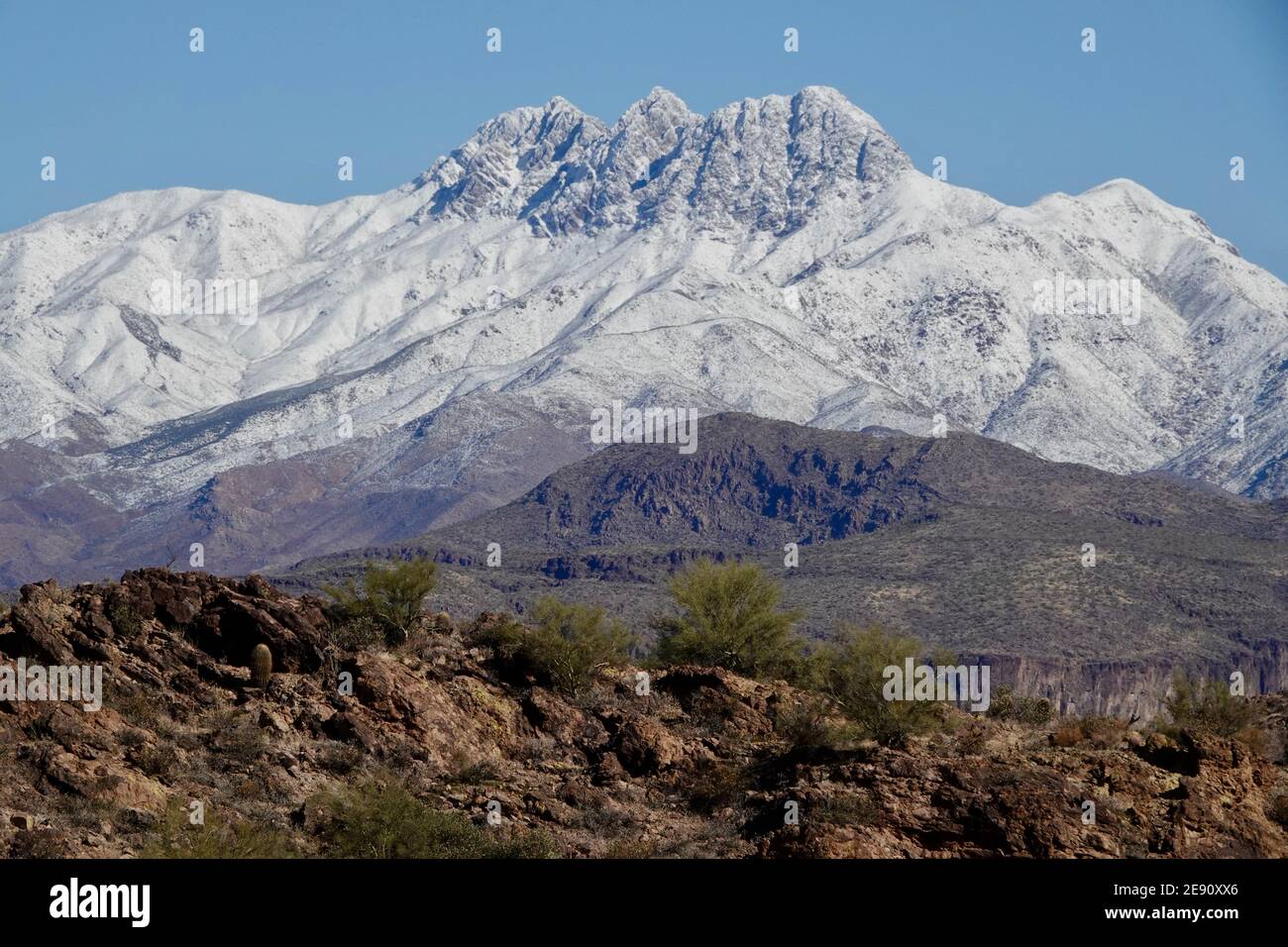 A winter storm covers the Four Peaks Mountains in snow in the Arizona ...