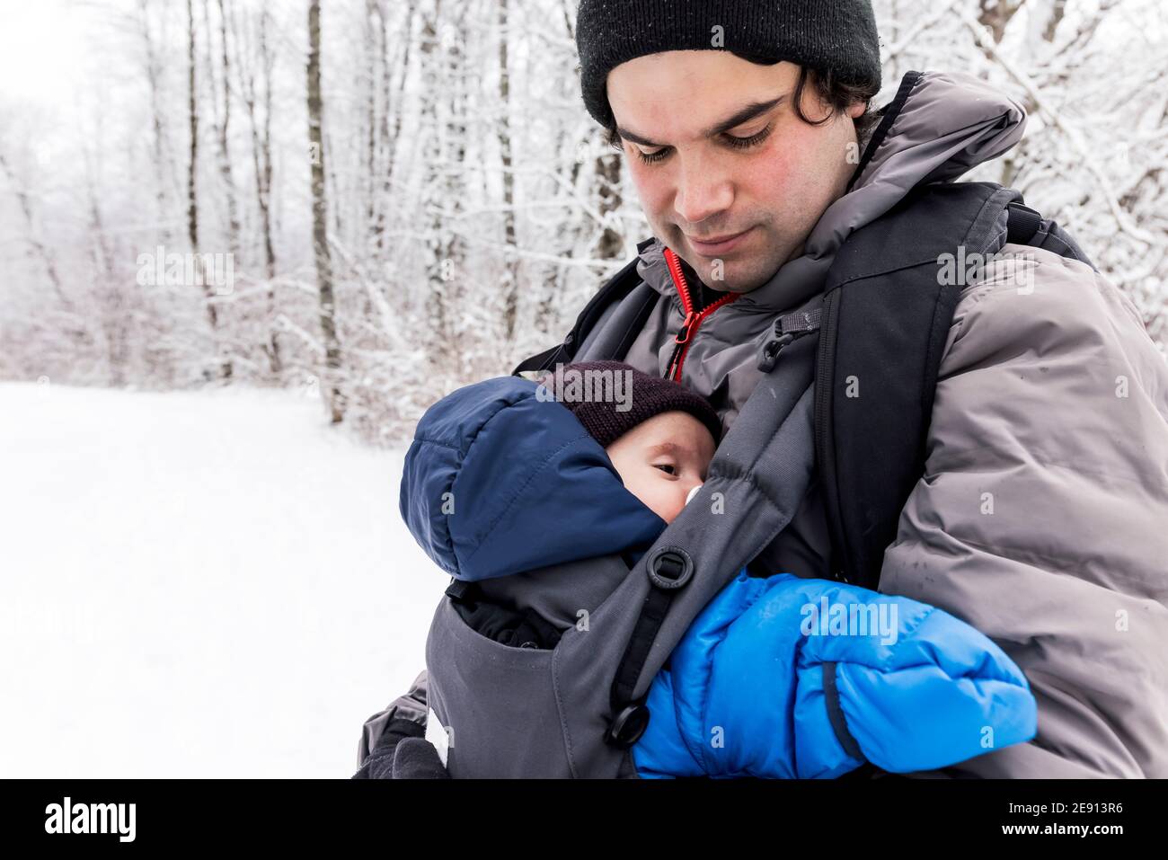 Man baby carrier hi-res stock photography and images - Alamy