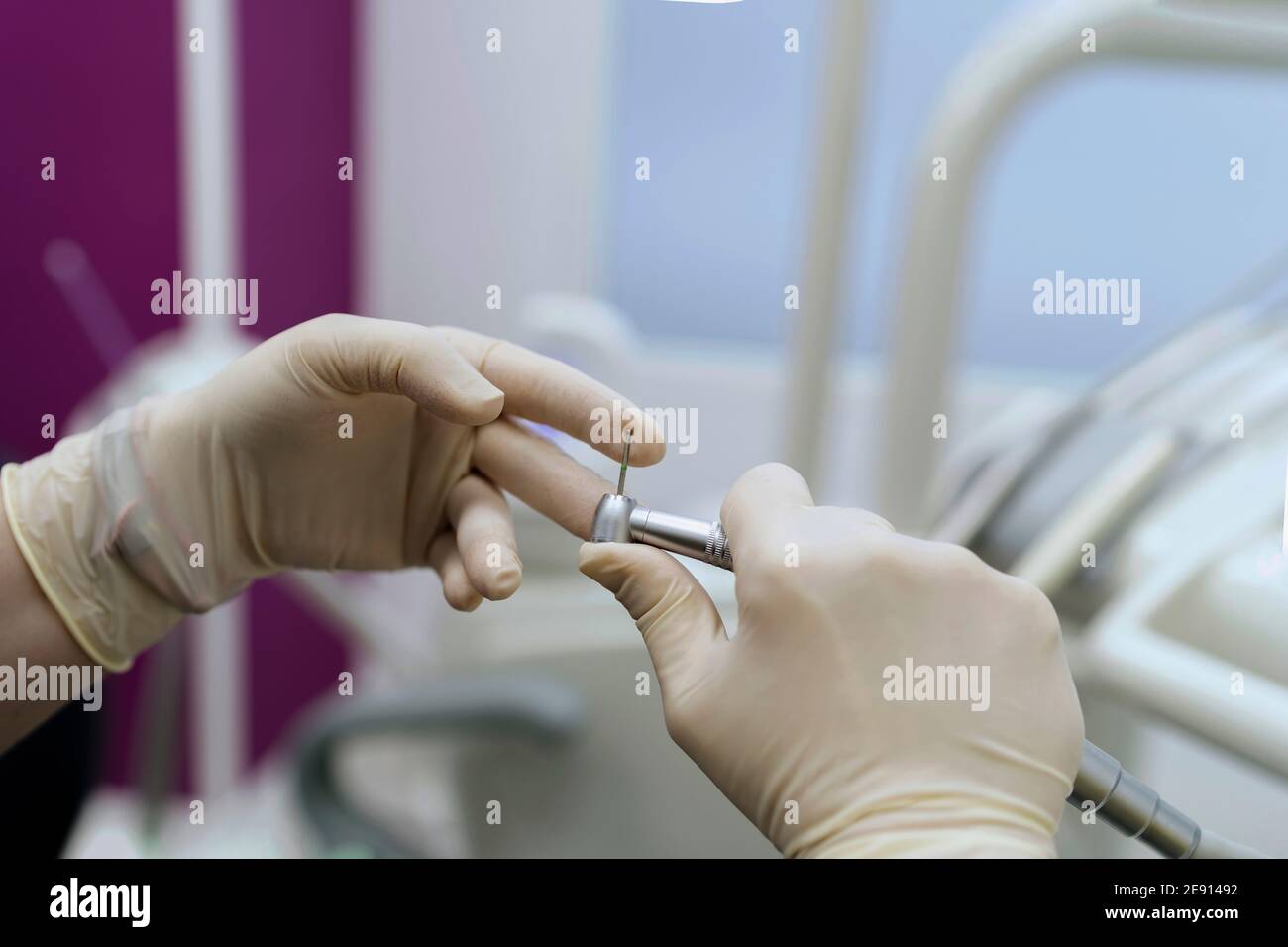 dentist manipulating his work tools Stock Photo - Alamy