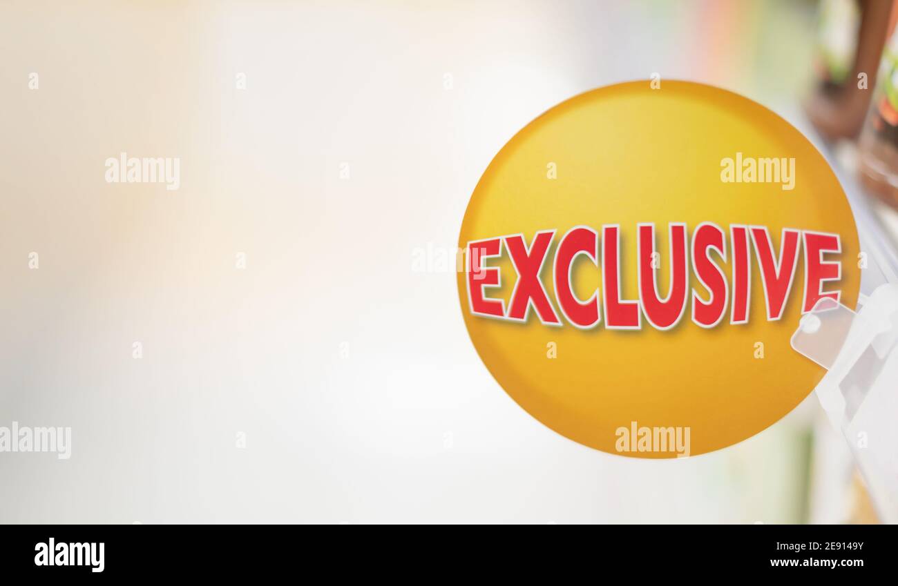 Exclusive sign on shelves in supermarket for promotion and special ...