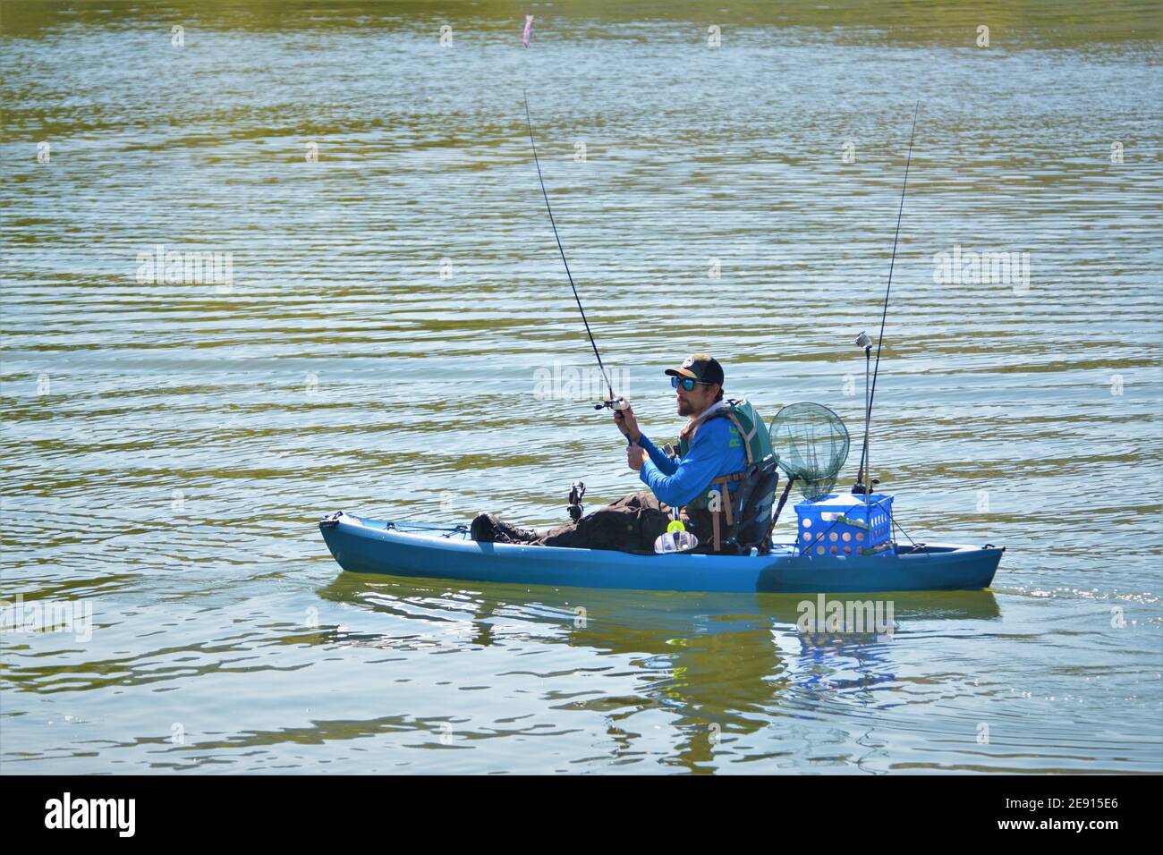Human powered fishing boat on water Clearlake in central northern ...