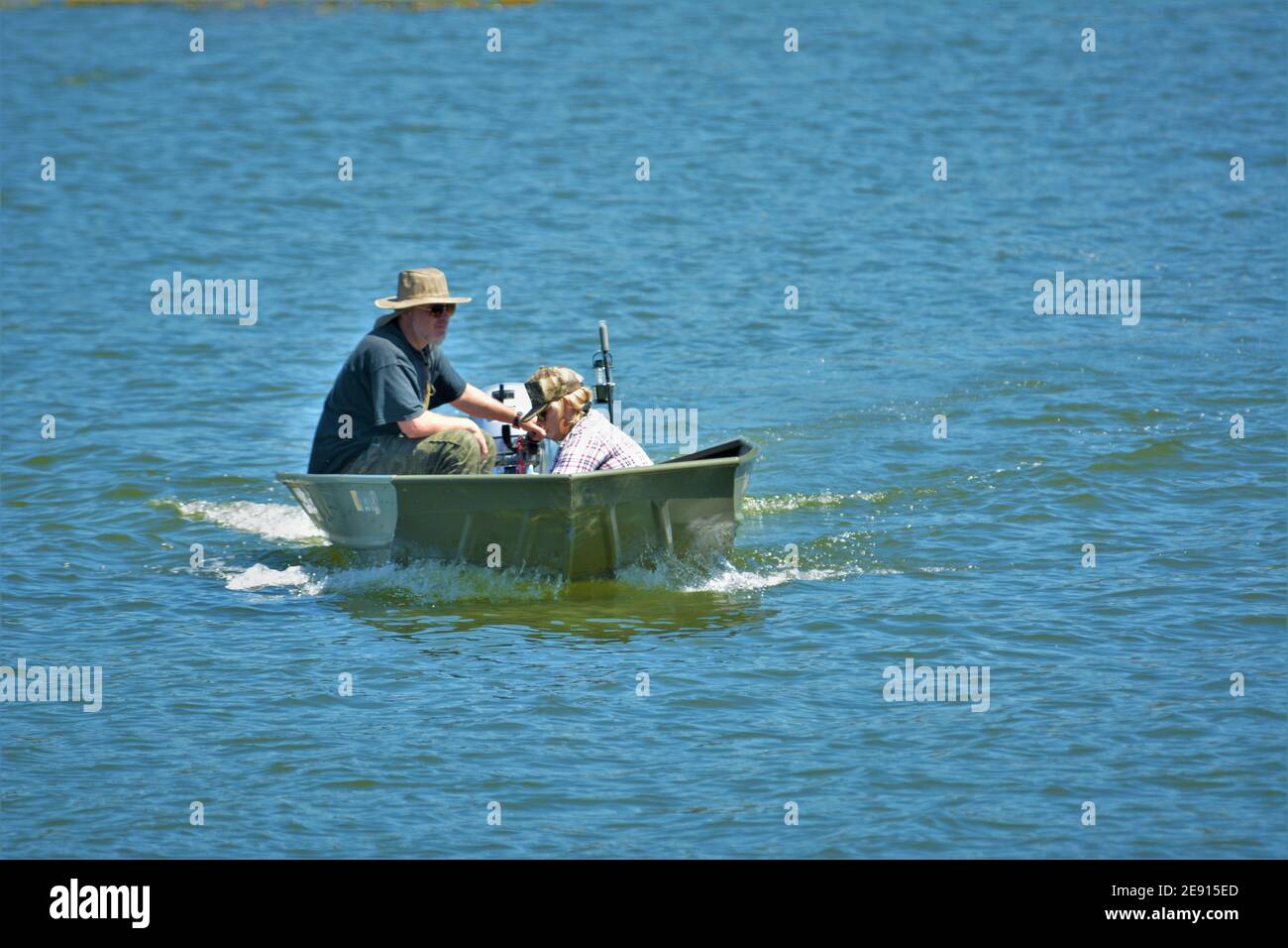 Family together Boating and kayaking on Clear Lake, Northern CA, the ...