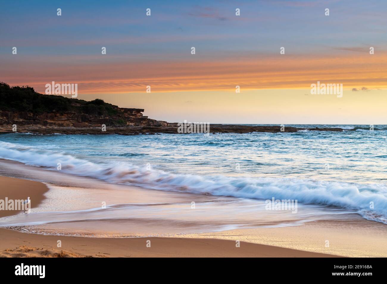 Sunset by the sea at Putty Beach in the Bouddi National Park on the ...