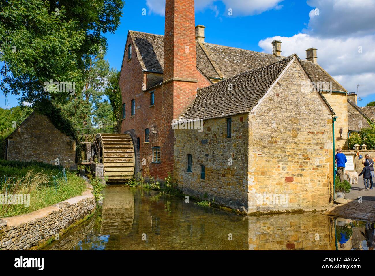 Old water mill in Lower Slaughter, a village in Cotswolds area, England ...
