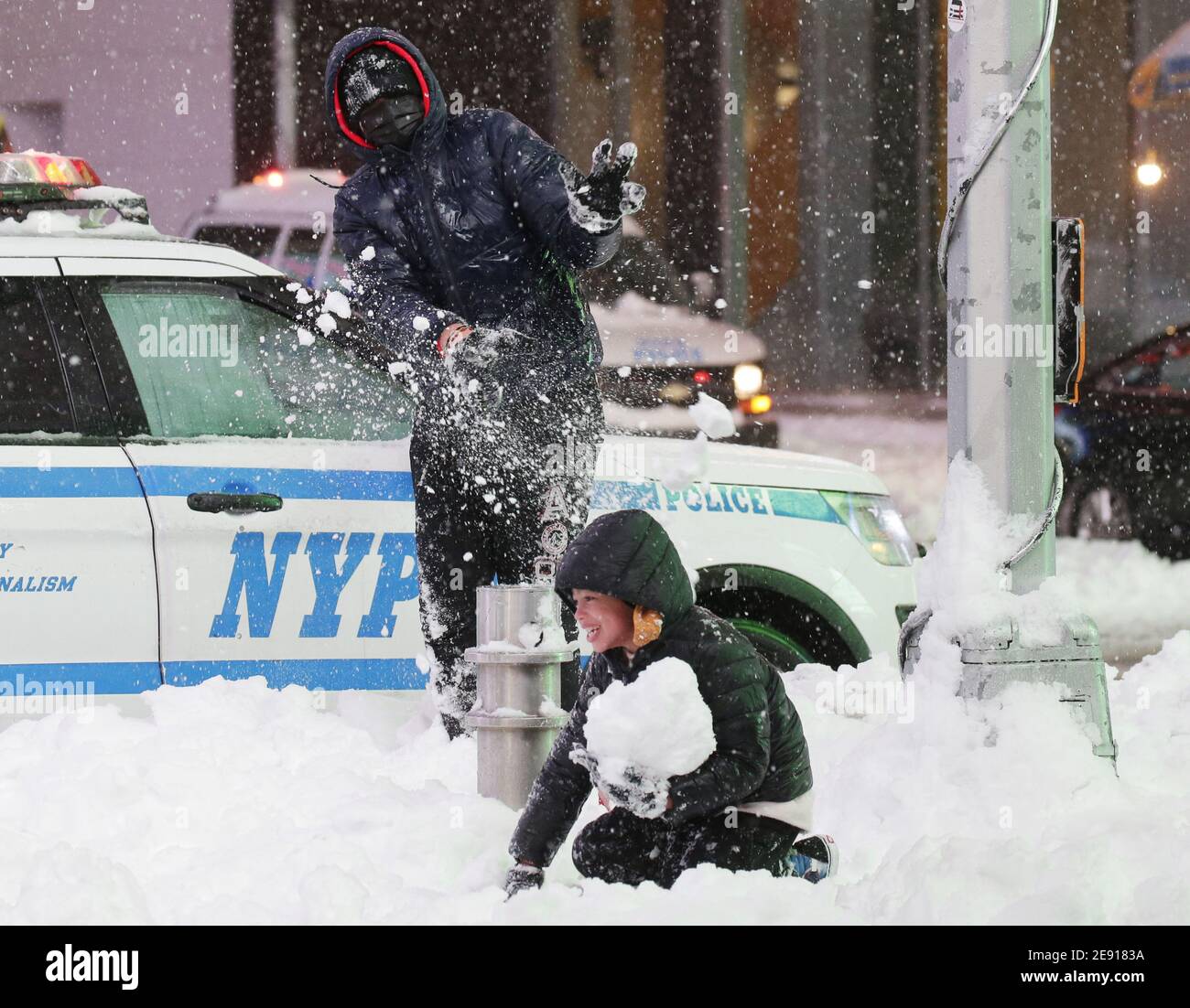New York, United States. 01st Feb, 2021. A man and child have a ...