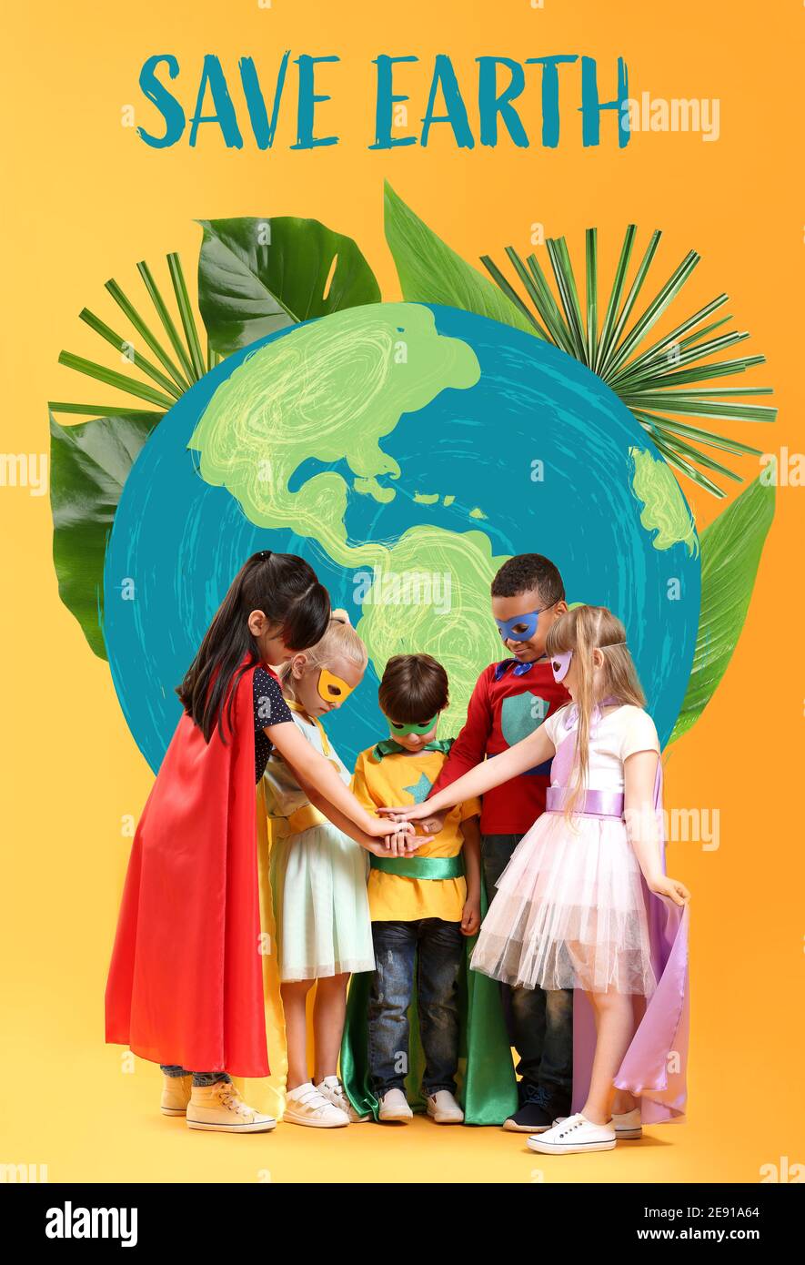 Cute little children dressed as superheroes near drawing of planet on ...