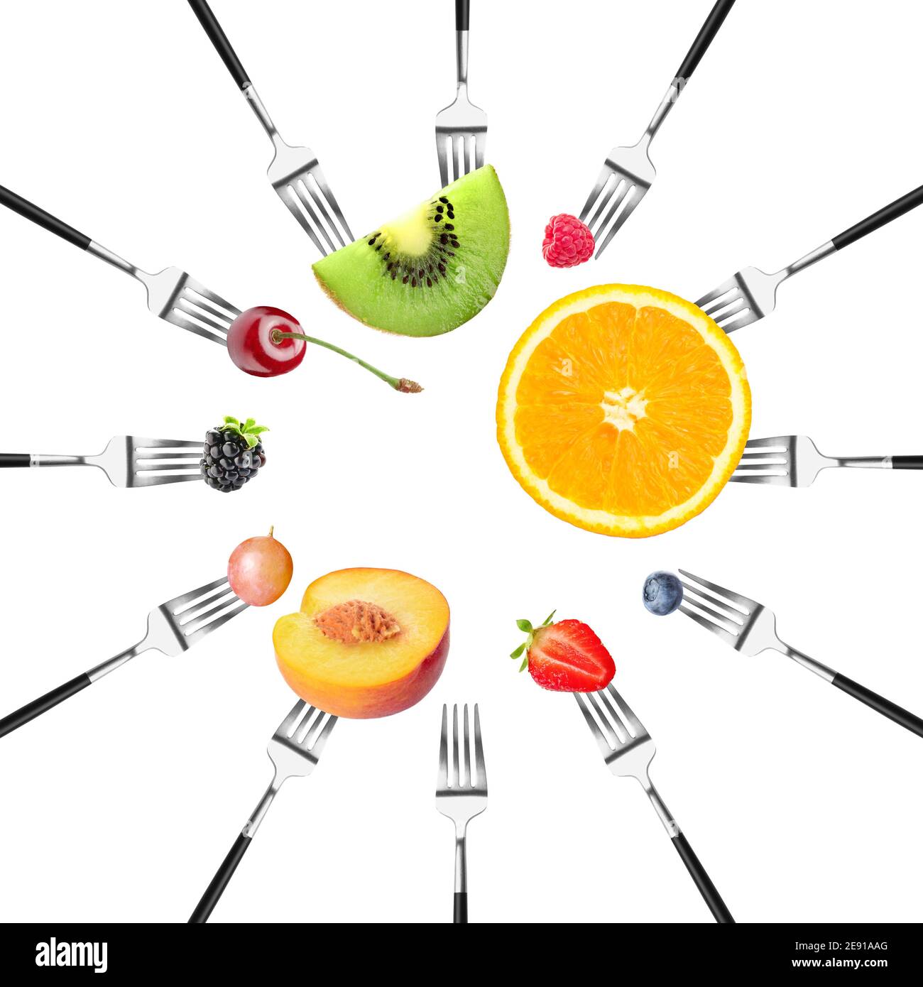 Different fruits impaled on forks against white background Stock Photo ...