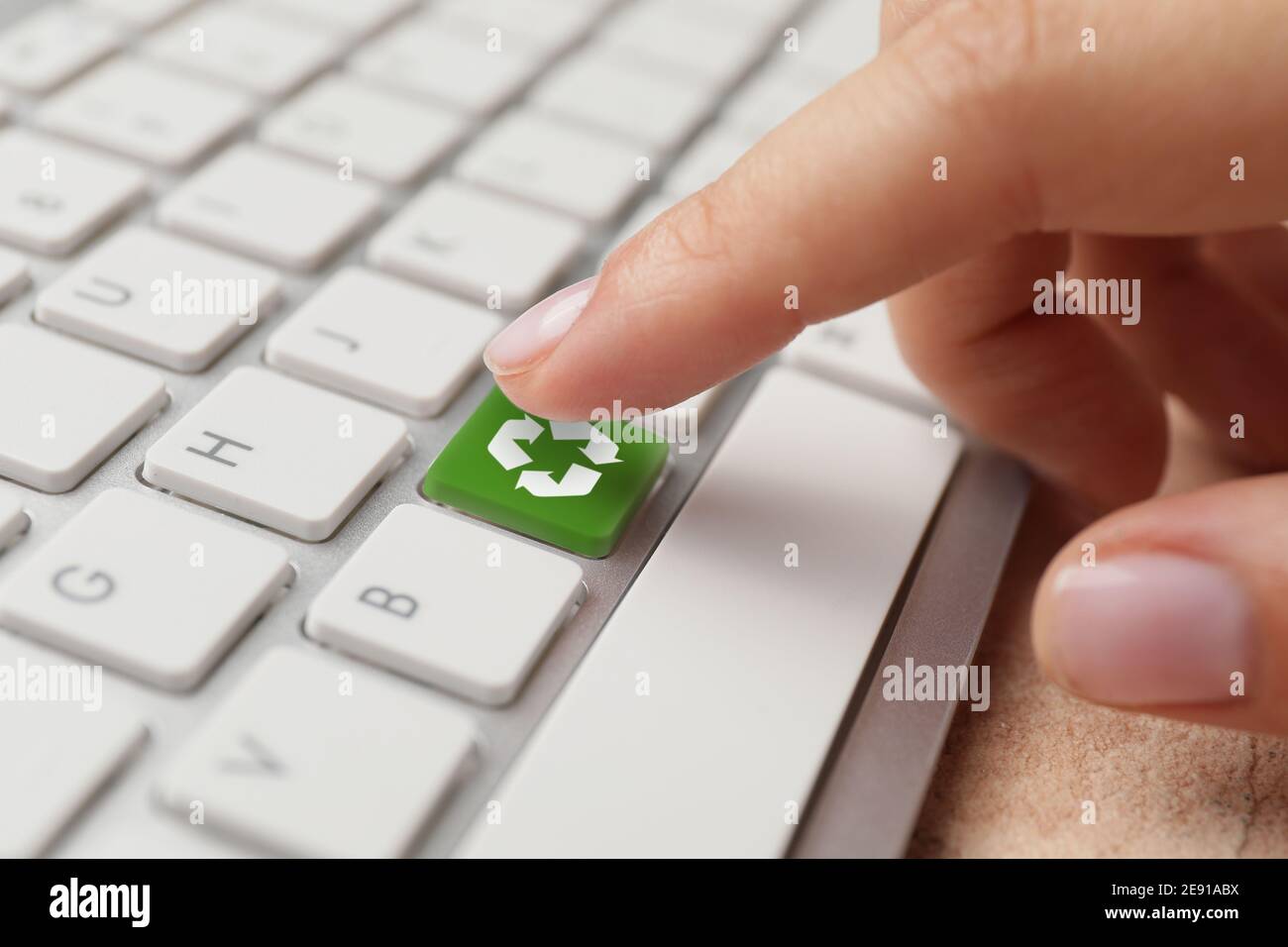 Woman pressing key on keyboard, closeup. Ecology concept Stock Photo ...