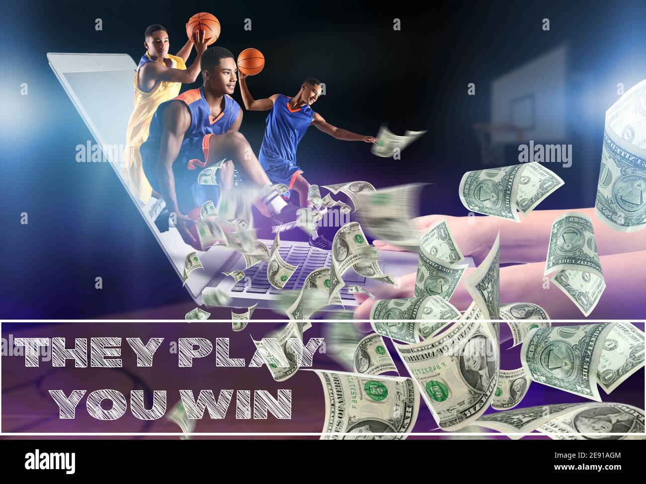 African-American basketball players running through screen of laptop ...