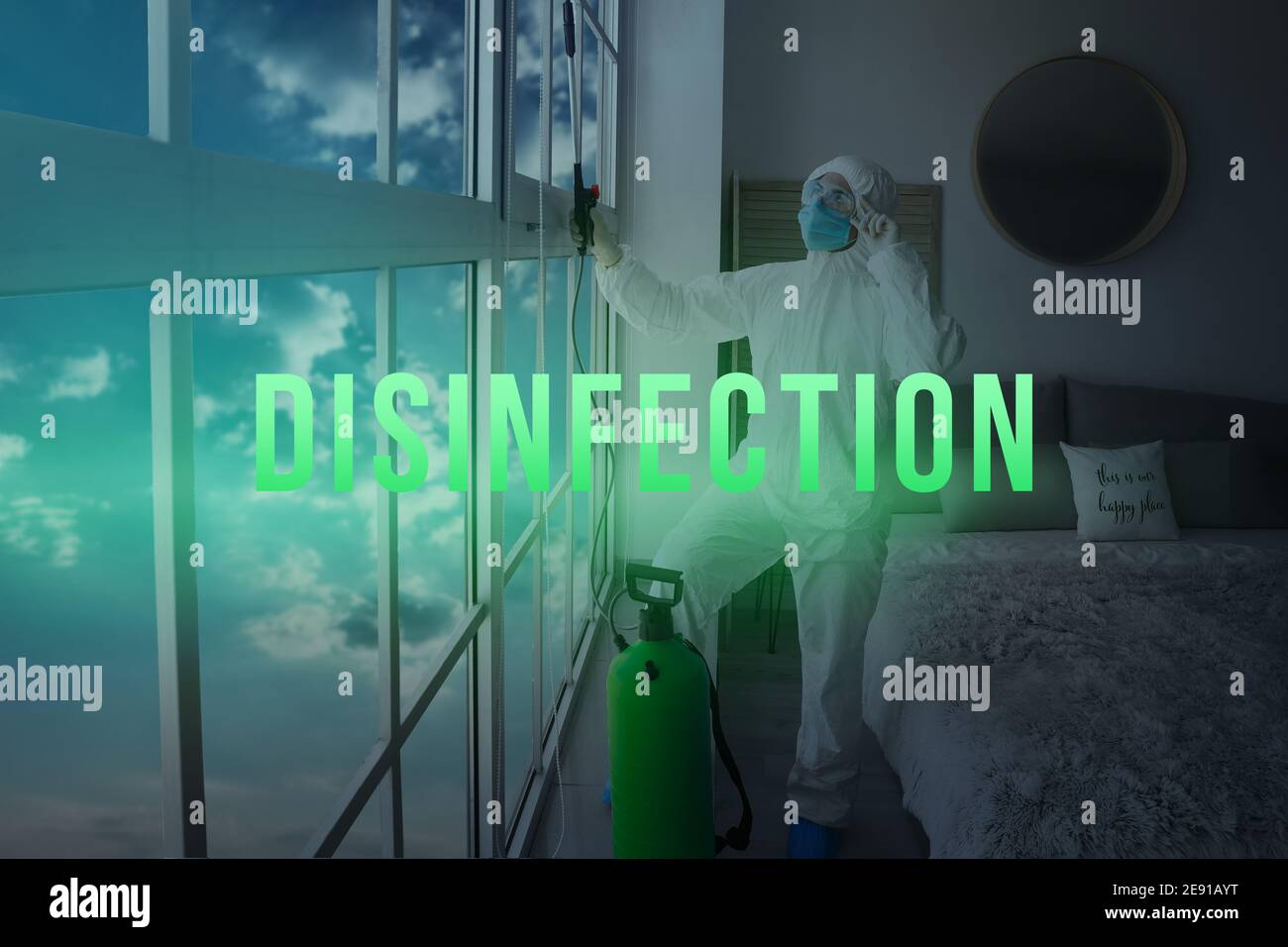 Worker in biohazard suit disinfecting house Stock Photo - Alamy