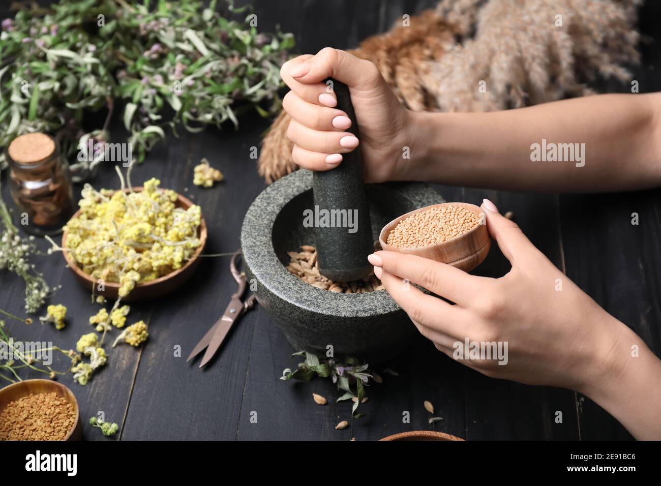 Female alchemist making elixir in laboratory Stock Photo - Alamy