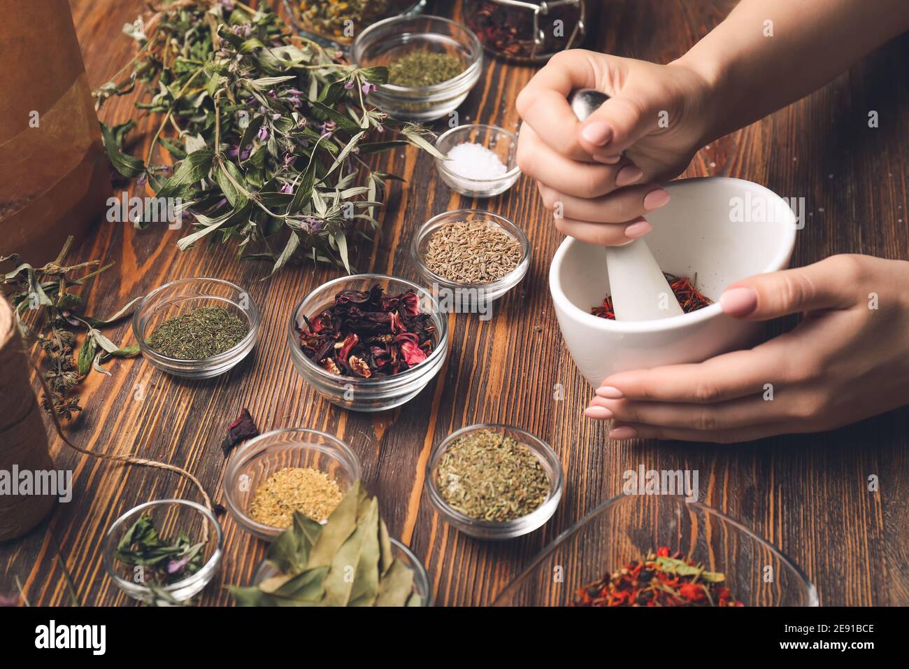 Female alchemist making elixir in laboratory Stock Photo - Alamy