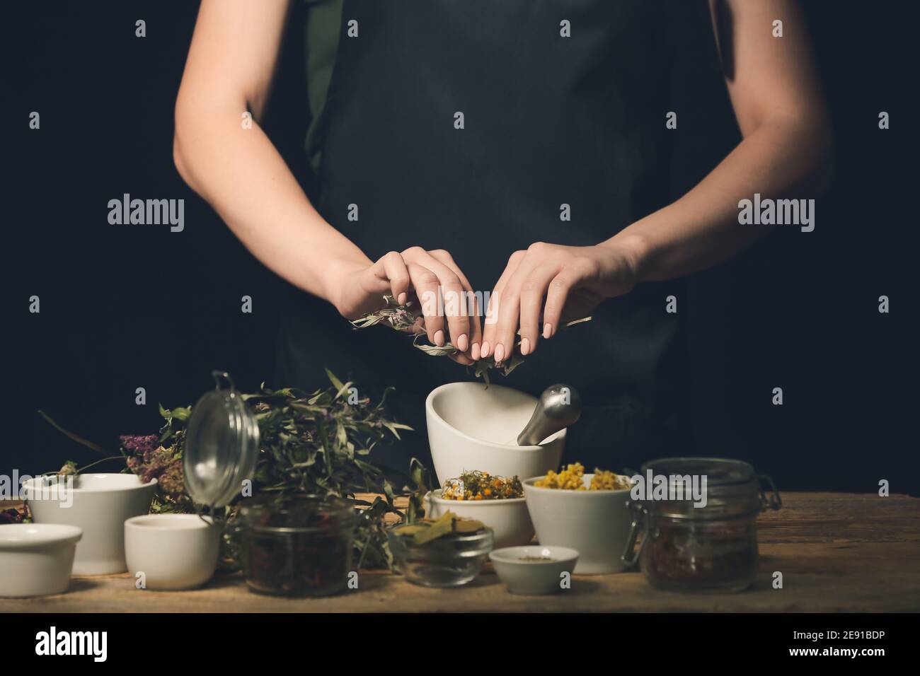 Female alchemist making elixir in laboratory Stock Photo - Alamy