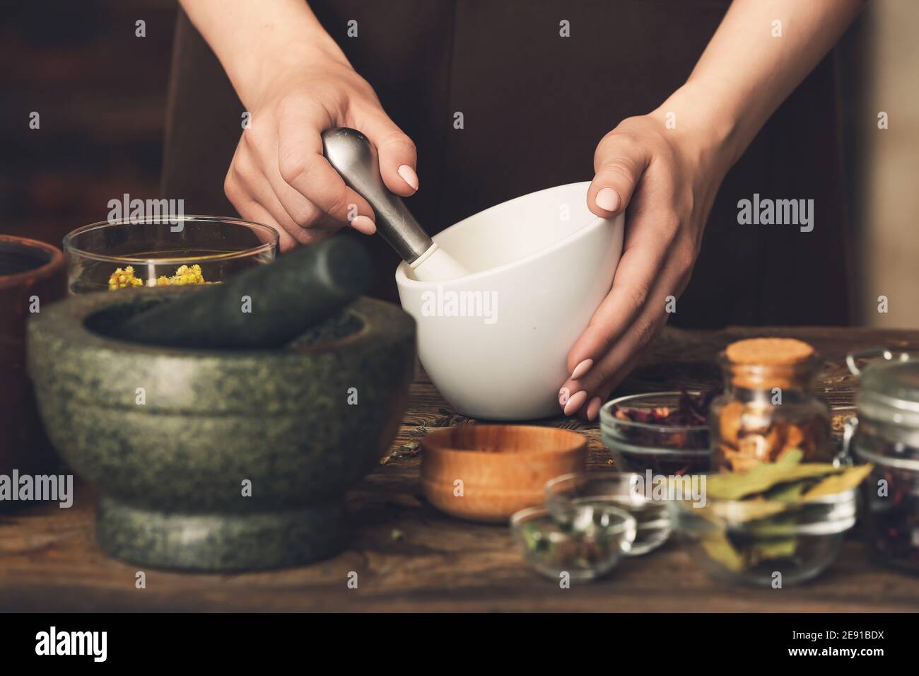 Female alchemist making elixir in laboratory Stock Photo - Alamy