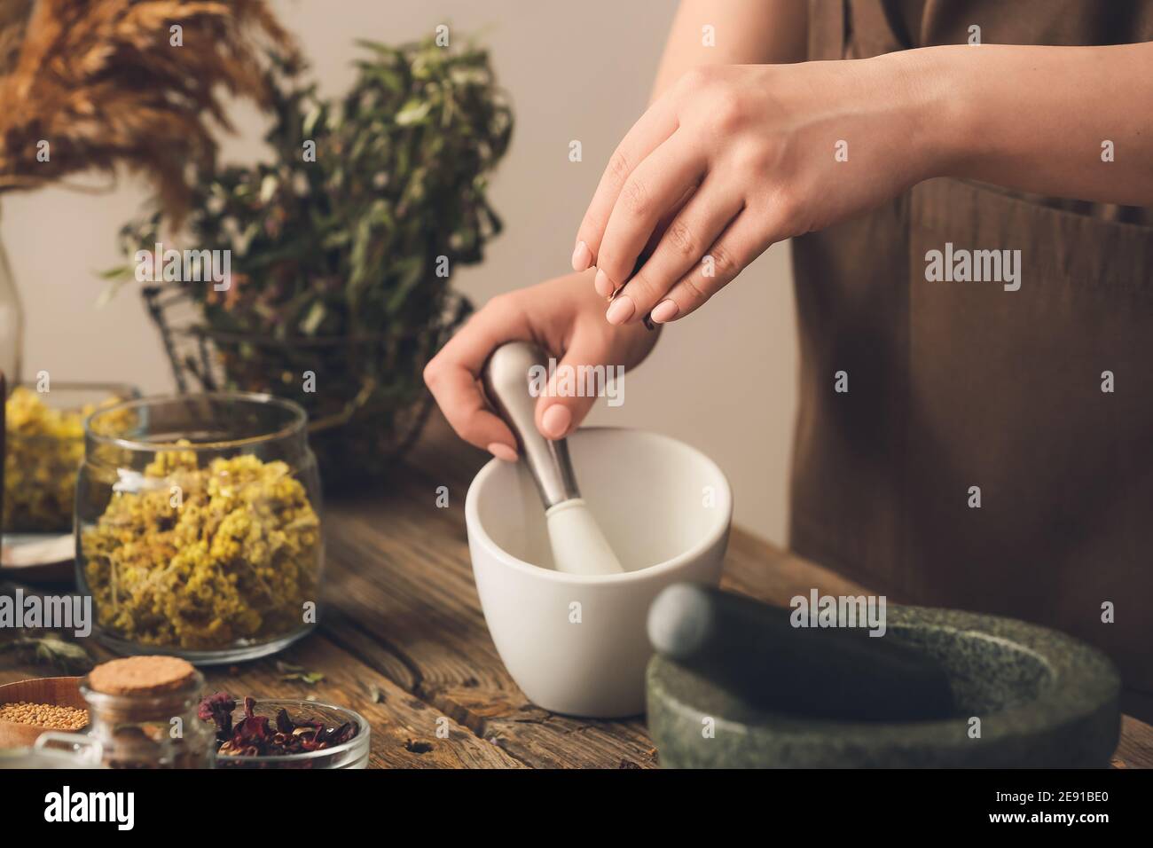 Female alchemist making elixir in laboratory Stock Photo - Alamy