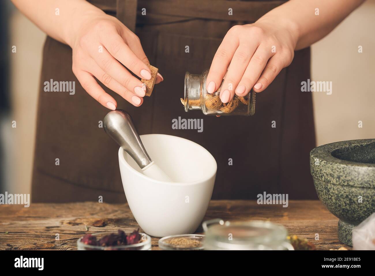 Female alchemist making elixir in laboratory Stock Photo - Alamy