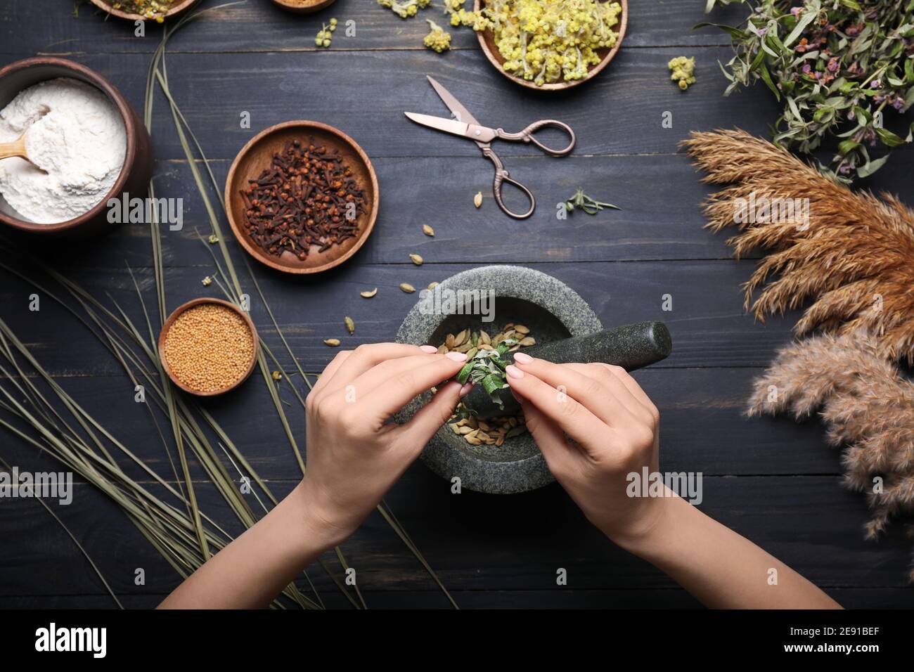 Female alchemist making elixir in laboratory Stock Photo - Alamy