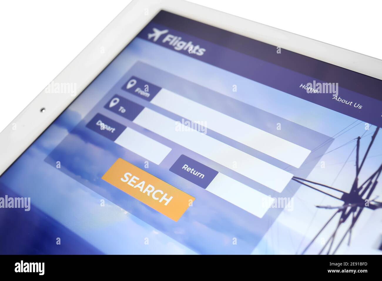 Open page of online booking service on screen of tablet computer ...