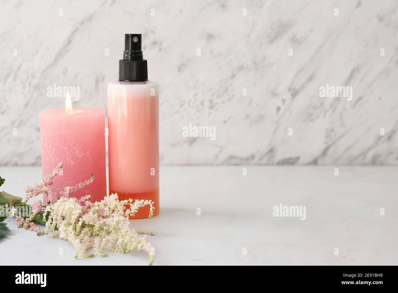 Natural air freshener and aroma candle on light background Stock Photo ...
