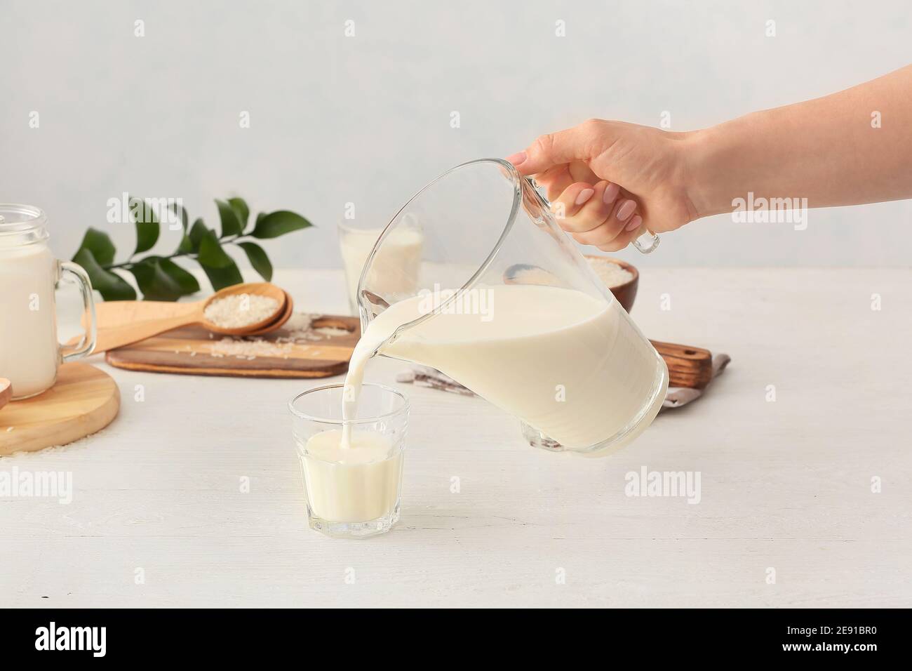 Woman pouring rice hi-res stock photography and images - Alamy