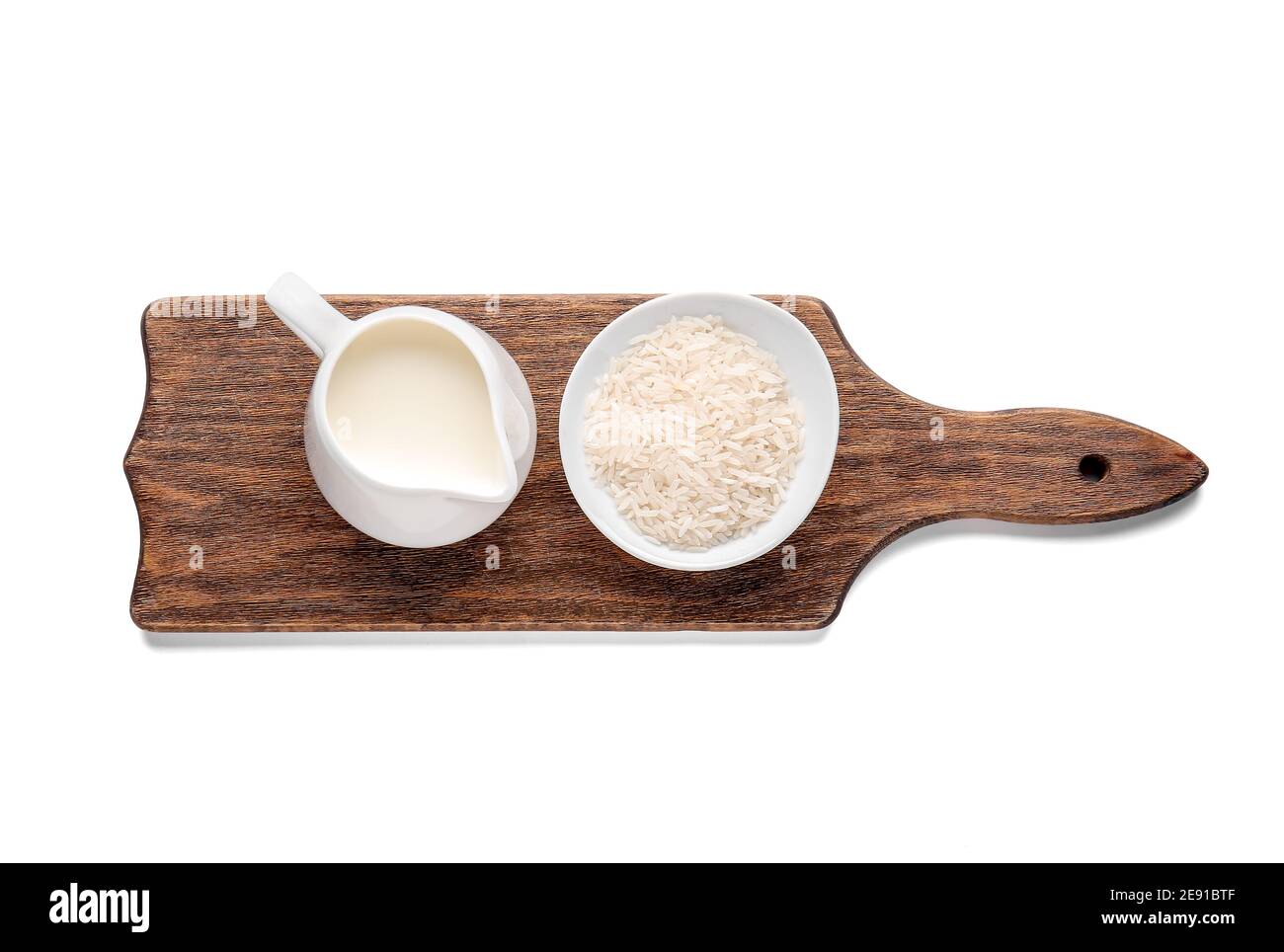 Jug of rice milk on white background Stock Photo - Alamy