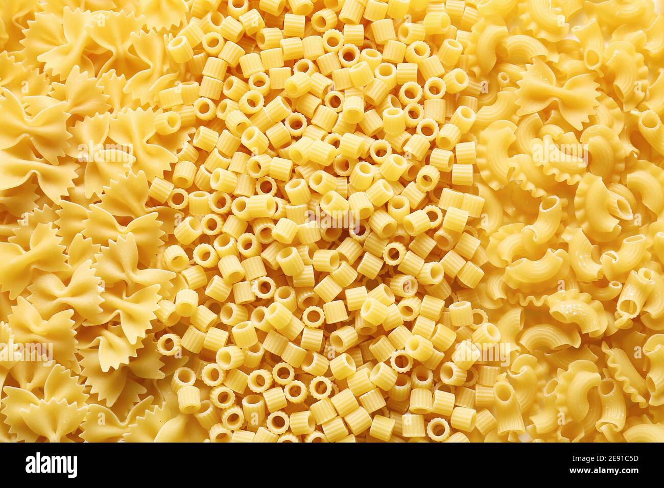 Dry pasta as background, top view Stock Photo - Alamy