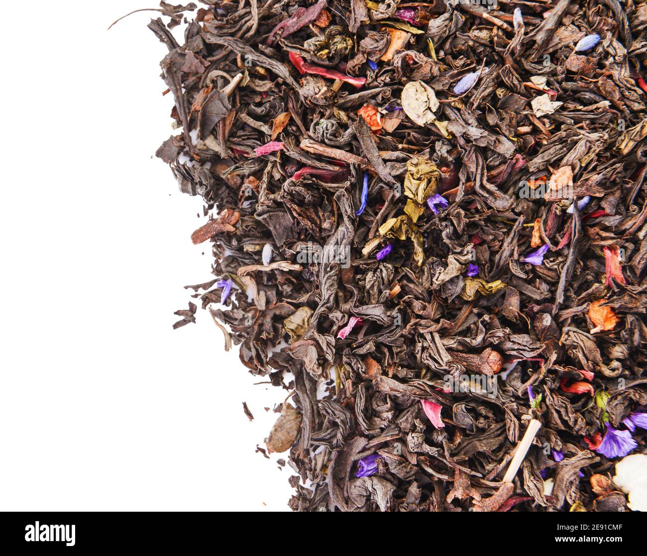 Dry tea leaves on white background Stock Photo - Alamy