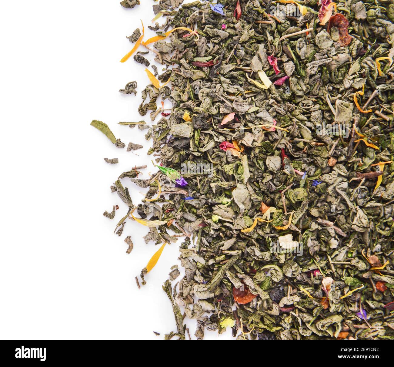 Dry tea leaves on white background Stock Photo - Alamy