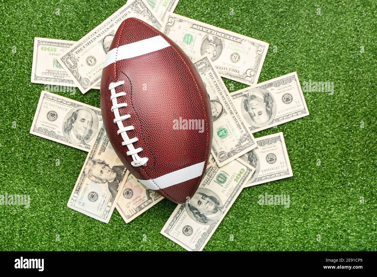Money and rugby ball on color background. Concept of sports bet Stock ...