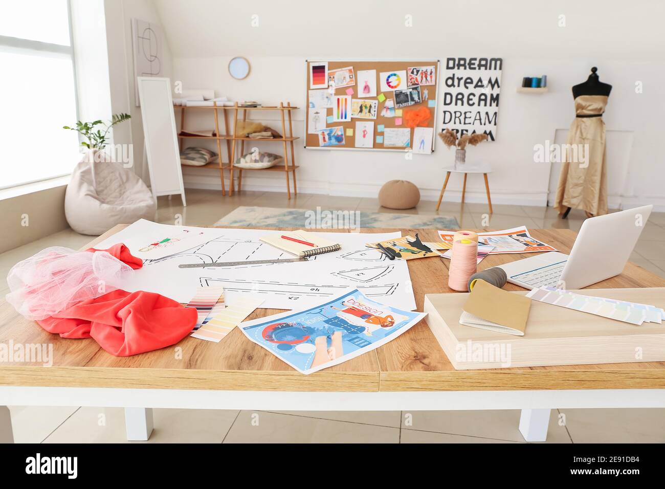 Stylish interior of fashion designer workplace Stock Photo - Alamy